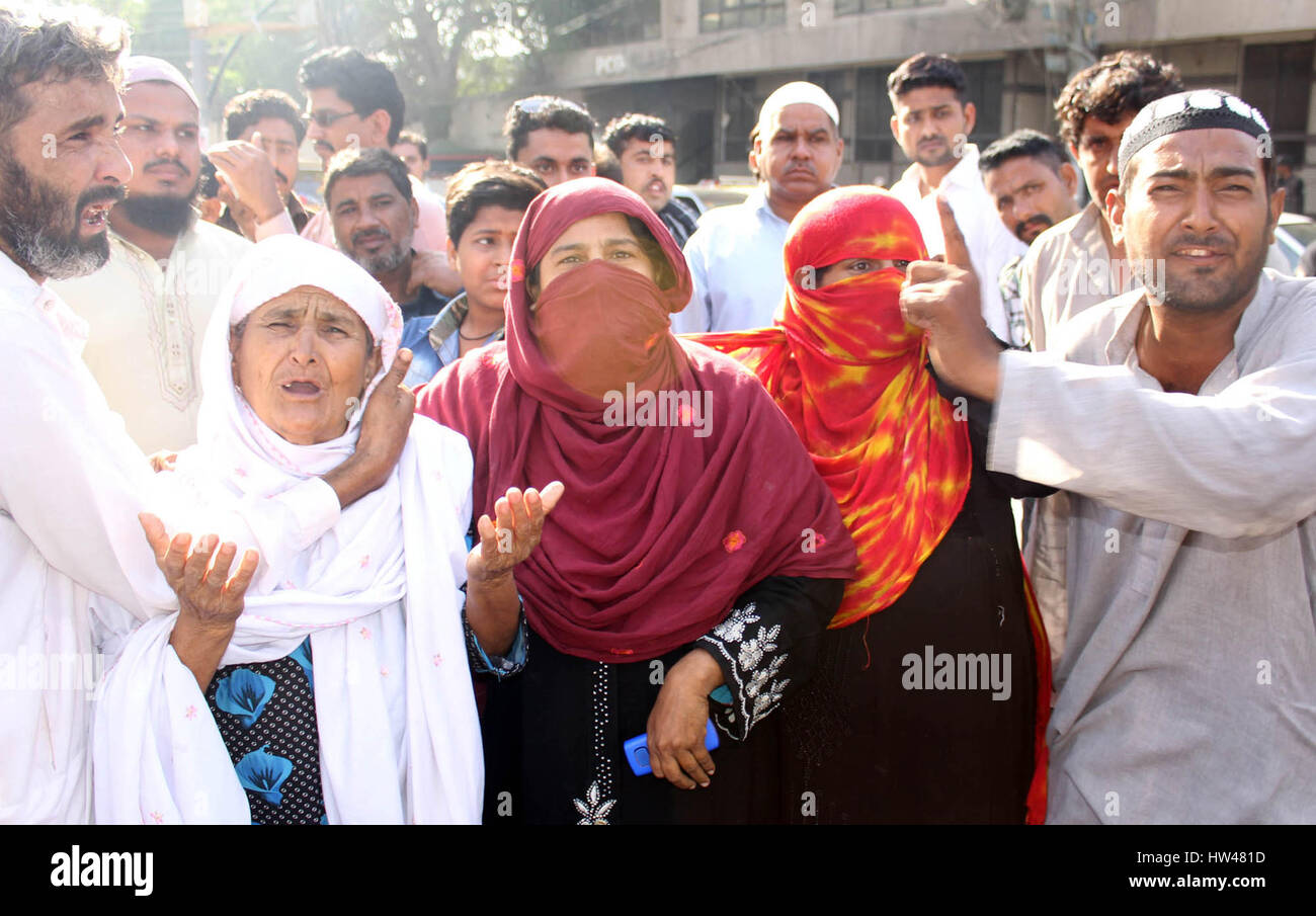 Karachi, Pakistan. 17th Mar, 2017. Relatives of Saeed Shah are holding ...