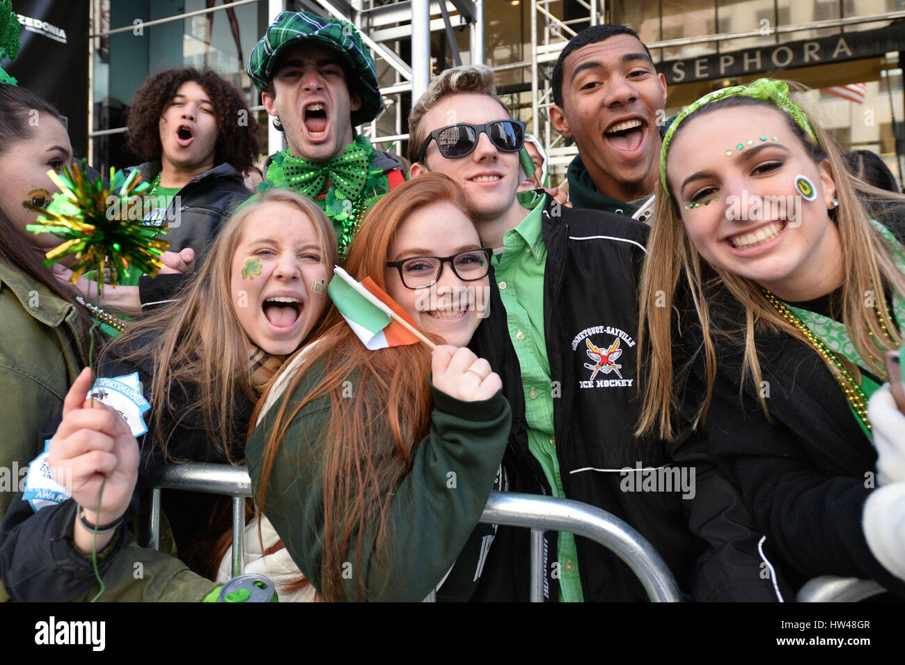 New York, USA. 17th Mar, 2017. People cheer as participants march on ...