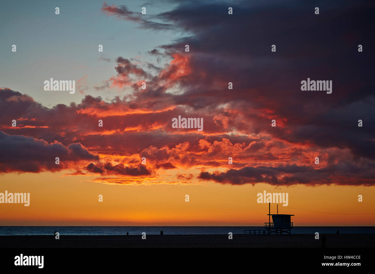 Clouds illuminated in colorful sunset sky Stock Photo - Alamy