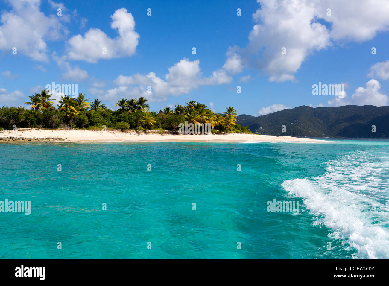 Ocean waves at tropical beach Stock Photo - Alamy