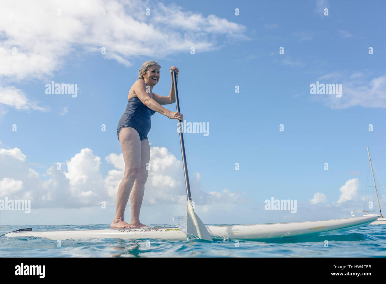 Woman paddling board hi-res stock photography and images - Alamy