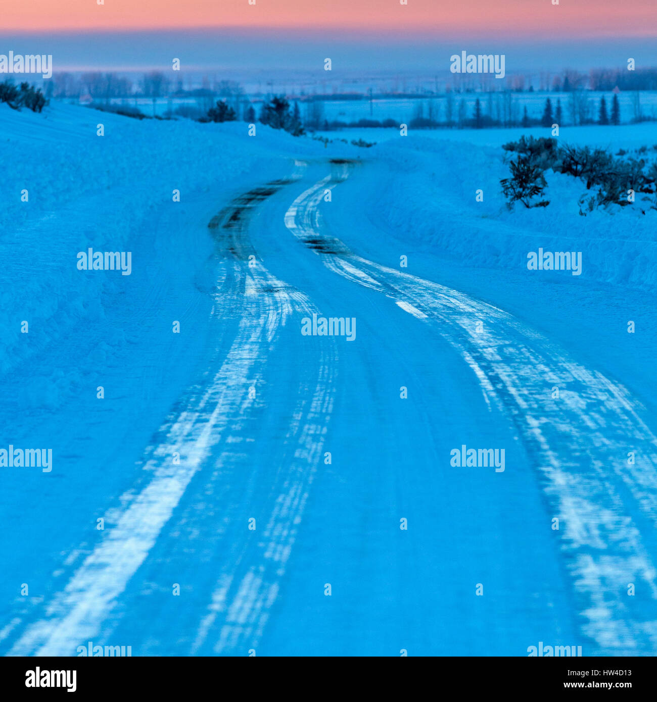 Driving on winding snow road hi-res stock photography and images - Alamy
