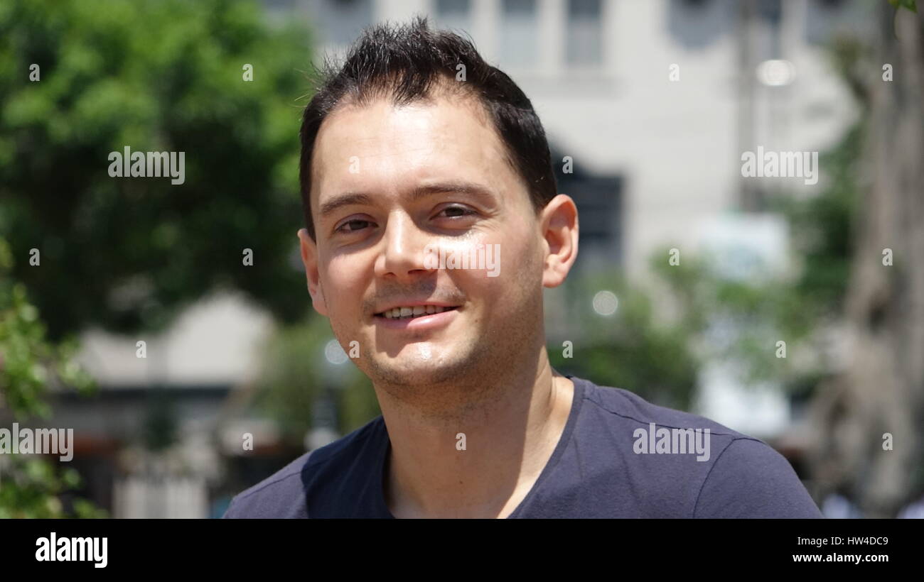 Happy Man Bright And Sunny Stock Photo - Alamy