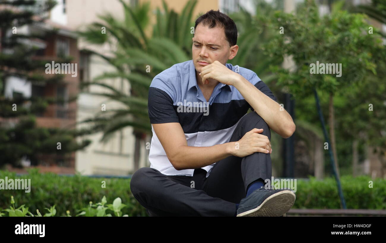 Man Sitting And Thinking Stock Photo - Alamy