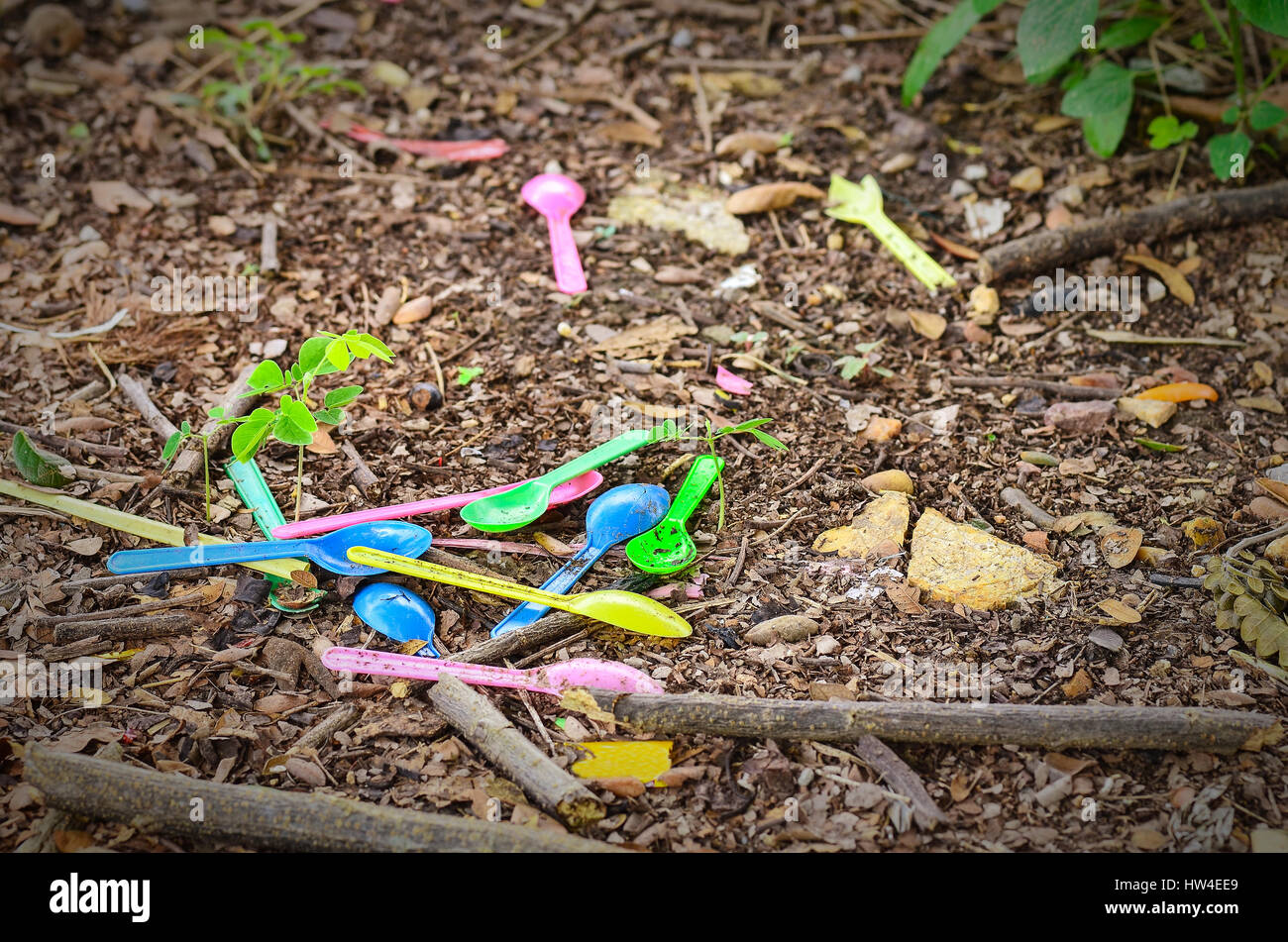 Disposable plastic spoon thrown on floor in vintage light Stock Photo ...
