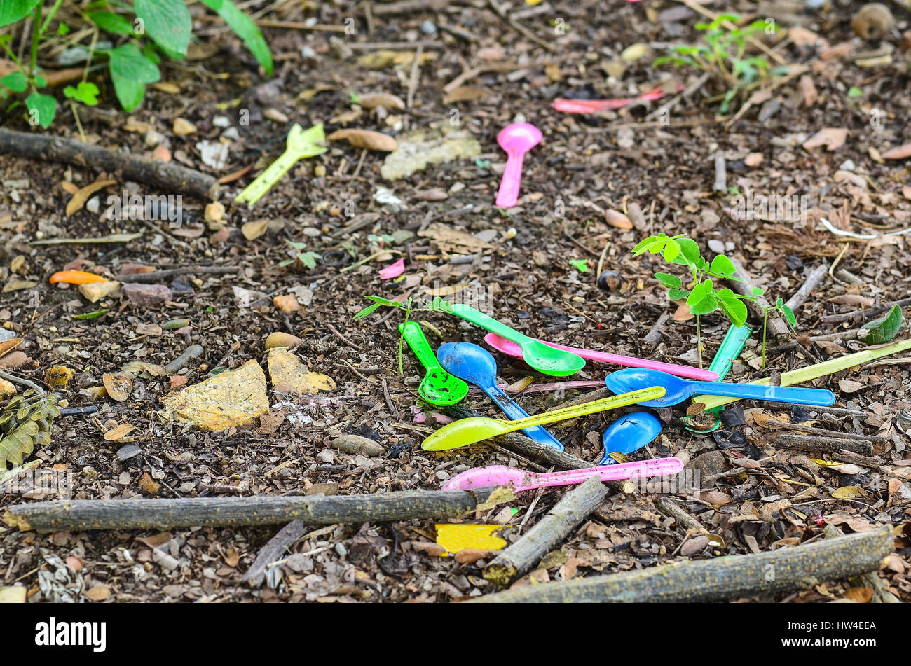 Disposable plastic spoon thrown on floor Stock Photo - Alamy