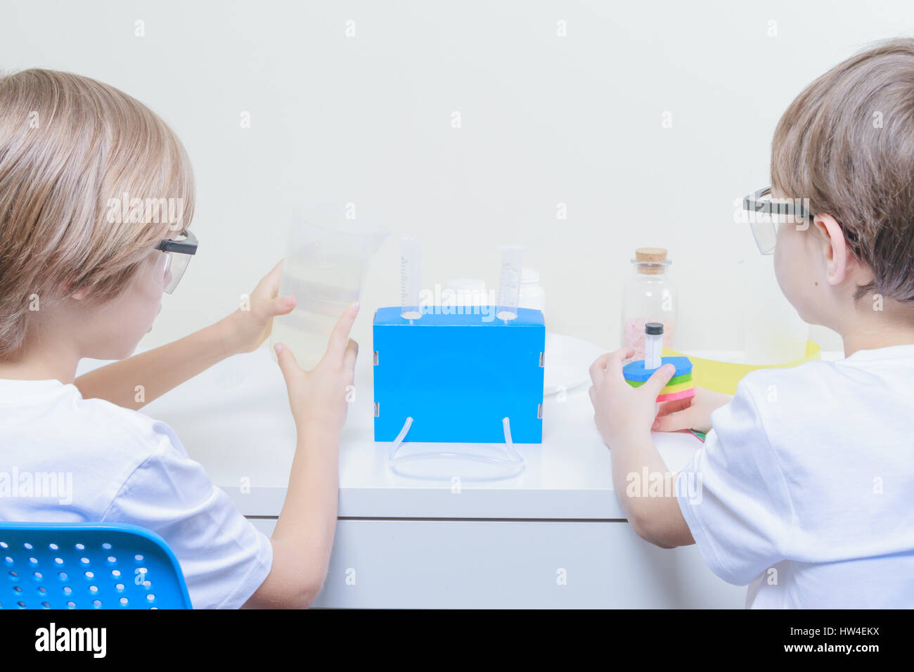 Two children making science experiments. Education concept Stock Photo ...