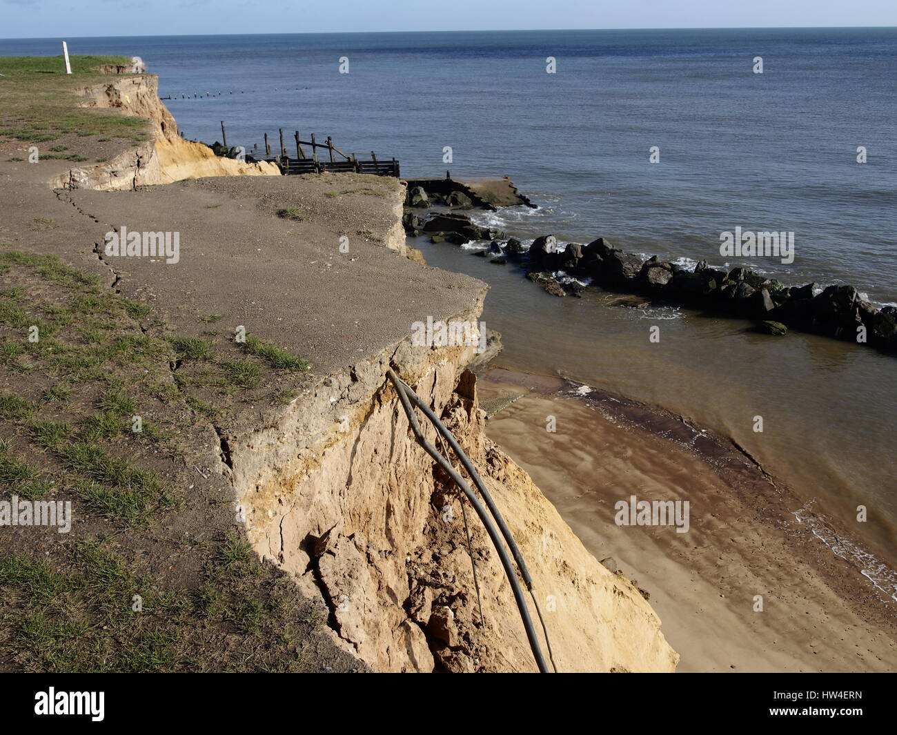 VIEW OF RETREATING COASTLINE CAUSED BY COASTAL EROSION, AT HAPPISBURGH ...