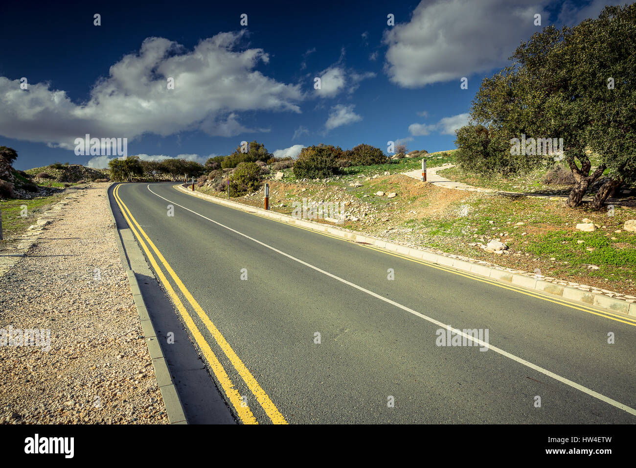 Asphalted road on the hill Stock Photo - Alamy