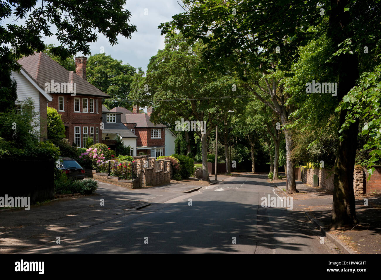 Suburban family homes in Nottingham, UK, seen from the roadside Stock ...