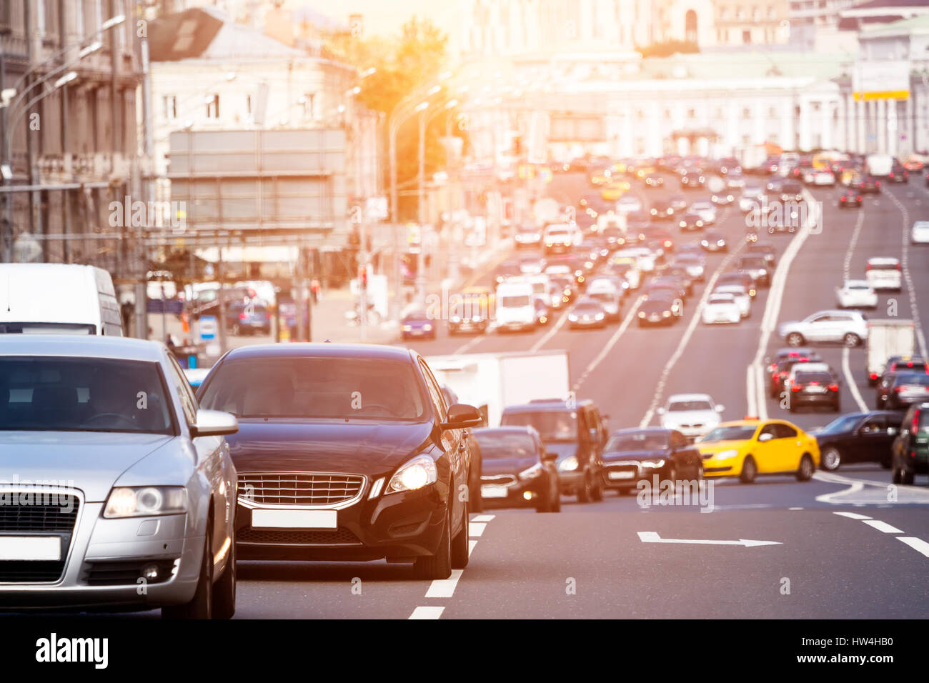Queue of cars on the turn during the rush hour Stock Photo - Alamy