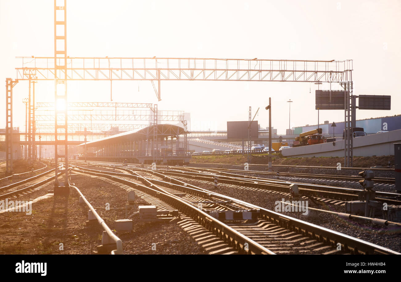 Railway junctions with switch and station on the background Stock Photo ...