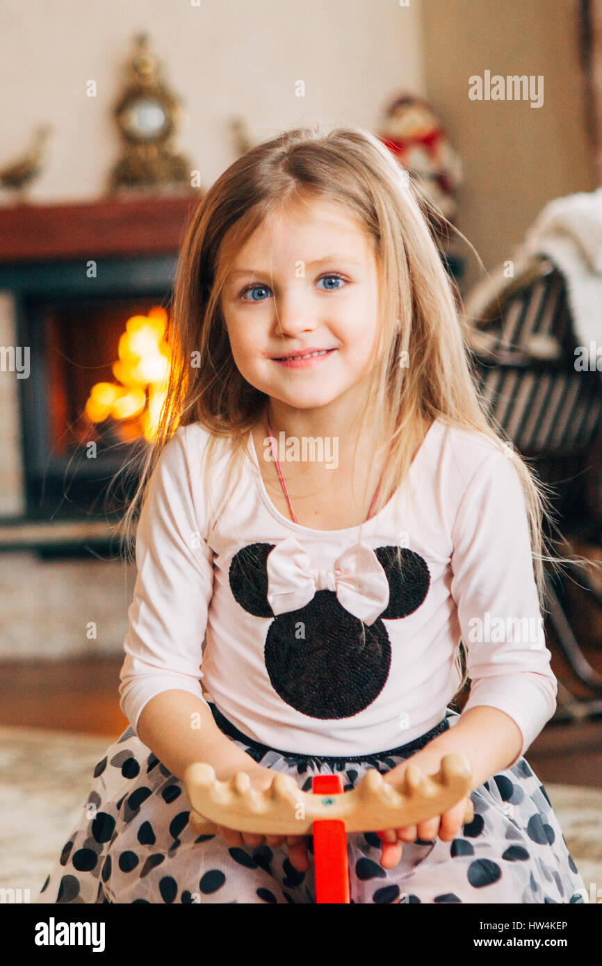 little cute girl looking at camera and smiling Stock Photo - Alamy