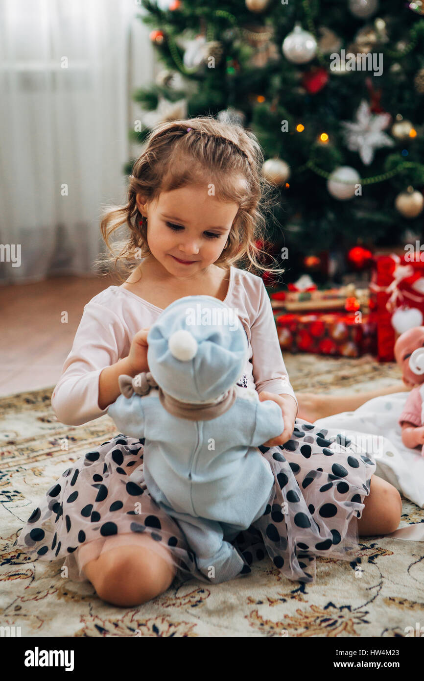 girl playing with doll Stock Photo - Alamy