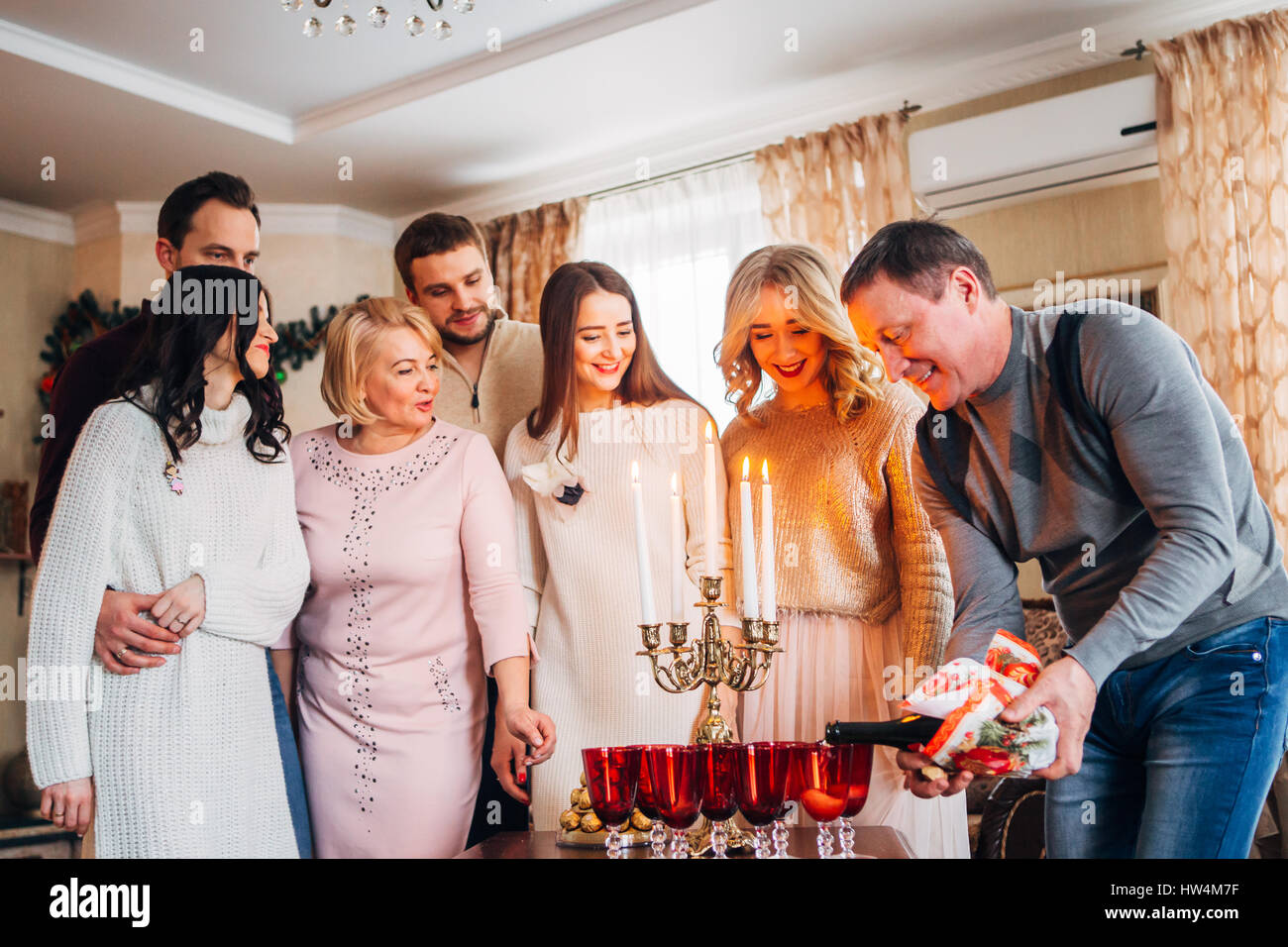 Happy family celebrating Stock Photo - Alamy