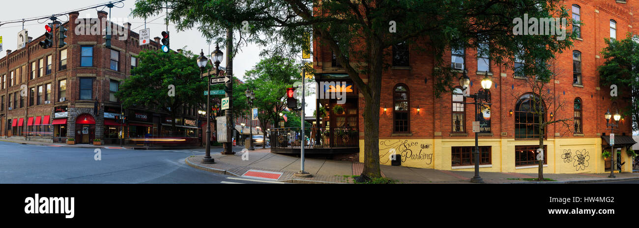 Town of Oneonta NY in the evening with street activity Stock Photo - Alamy