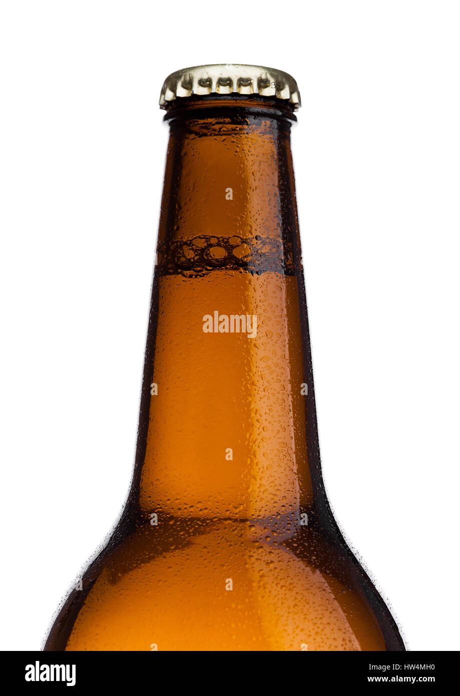 Brown glass beer bottle with yellow cap isolated Stock Photo - Alamy