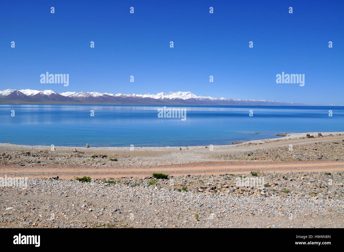 Beautiful Namtso lake landscape with snow peak mountains around it ...