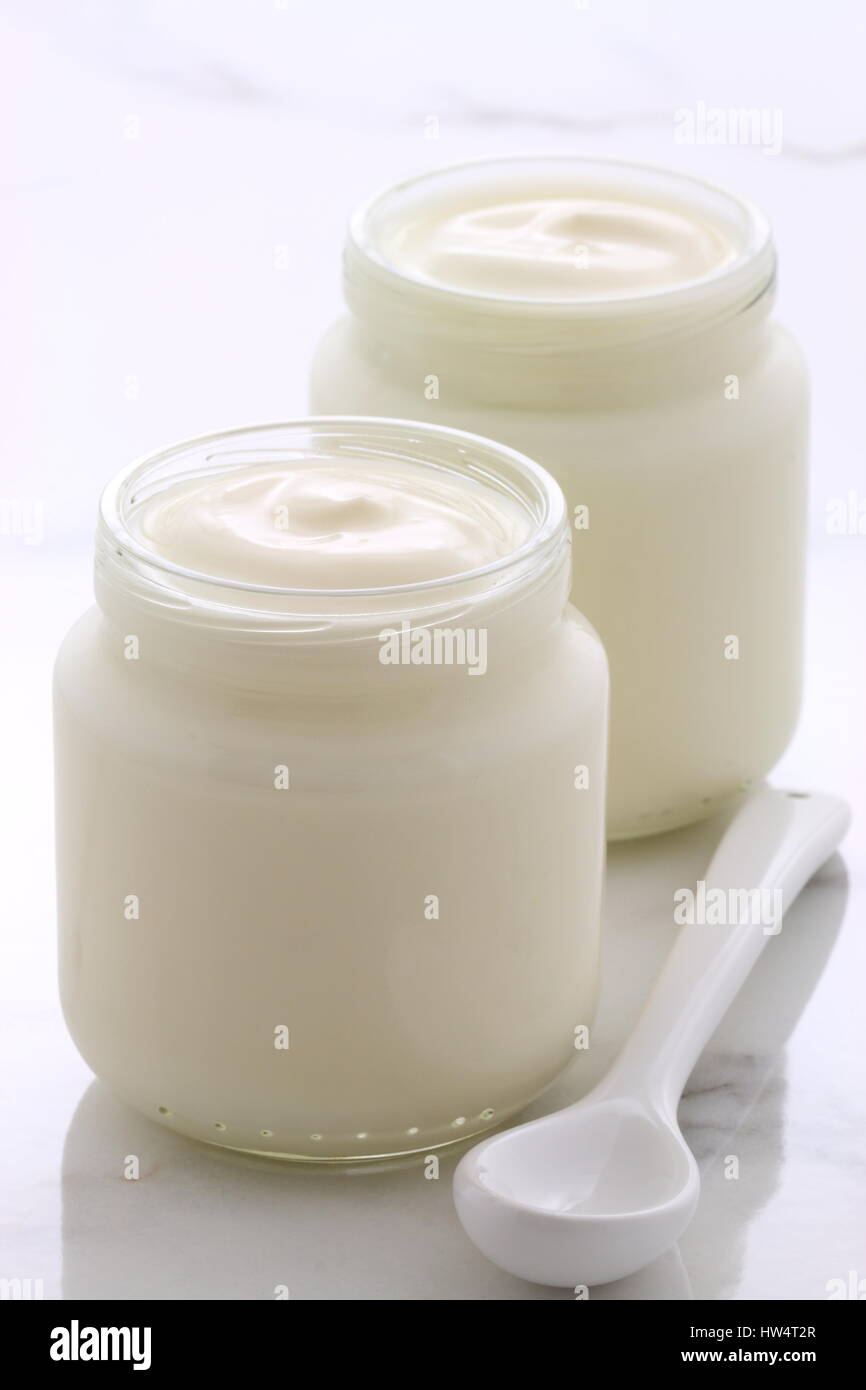 Delicious, nutritious and healthy fresh plain yogurt pot. On vintage ...