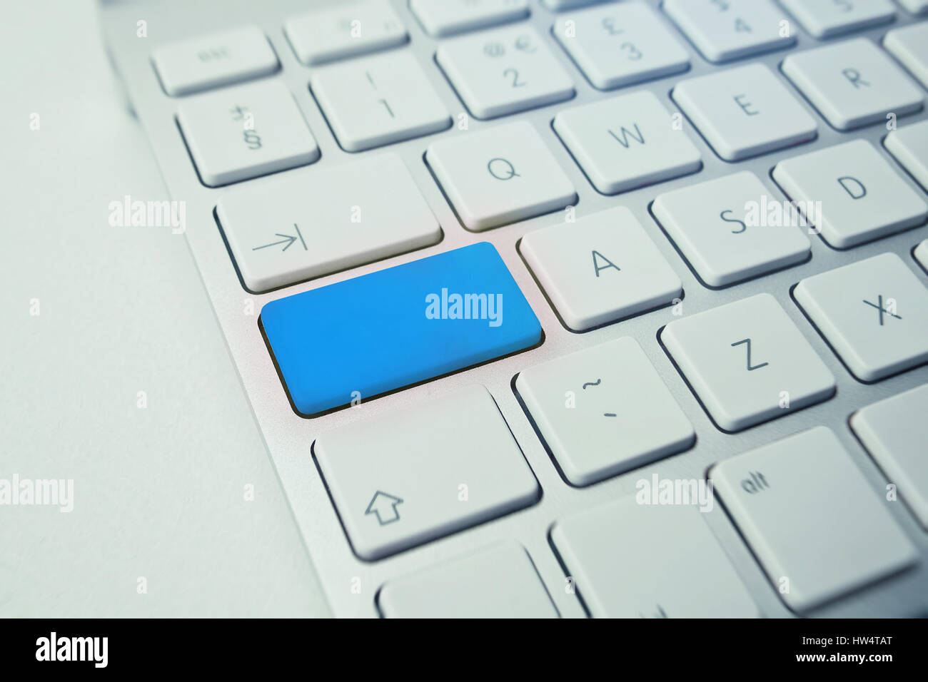 dynamic keyboard with blue button Stock Photo - Alamy