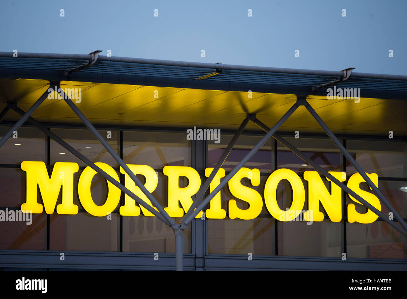 Morrisons supermarket sign logo Stock Photo - Alamy