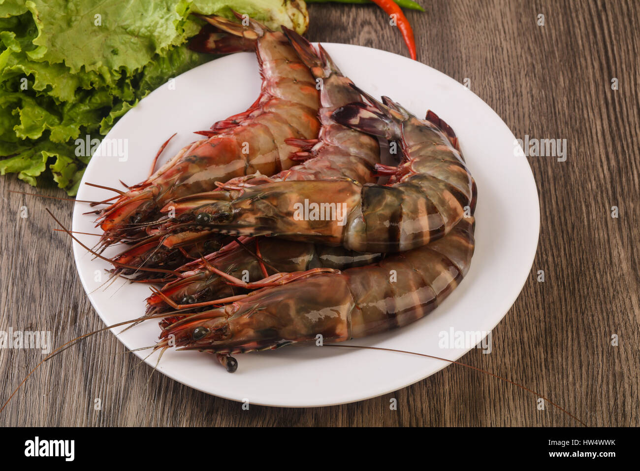 Raw big tiger prawn - ready for cooking Stock Photo - Alamy