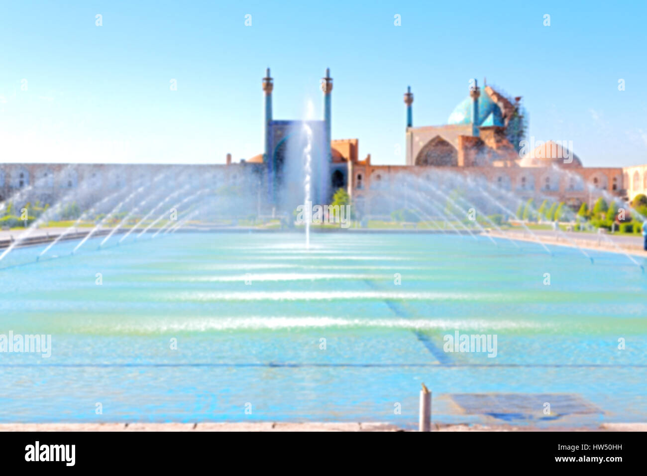 in iran old square mosque and fountain water backlight Stock Photo - Alamy