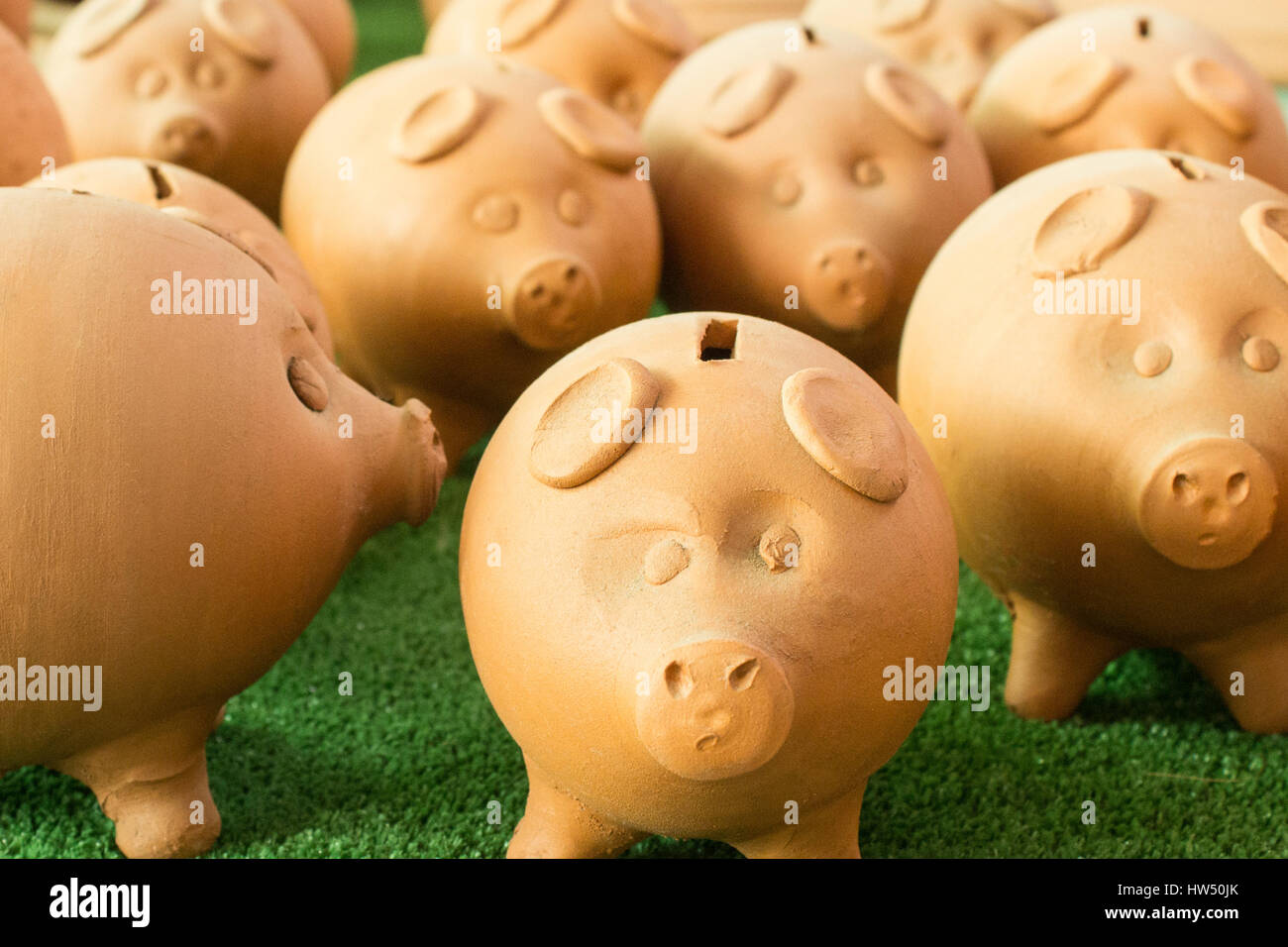 group of many money saving pigs - finance concept Stock Photo - Alamy