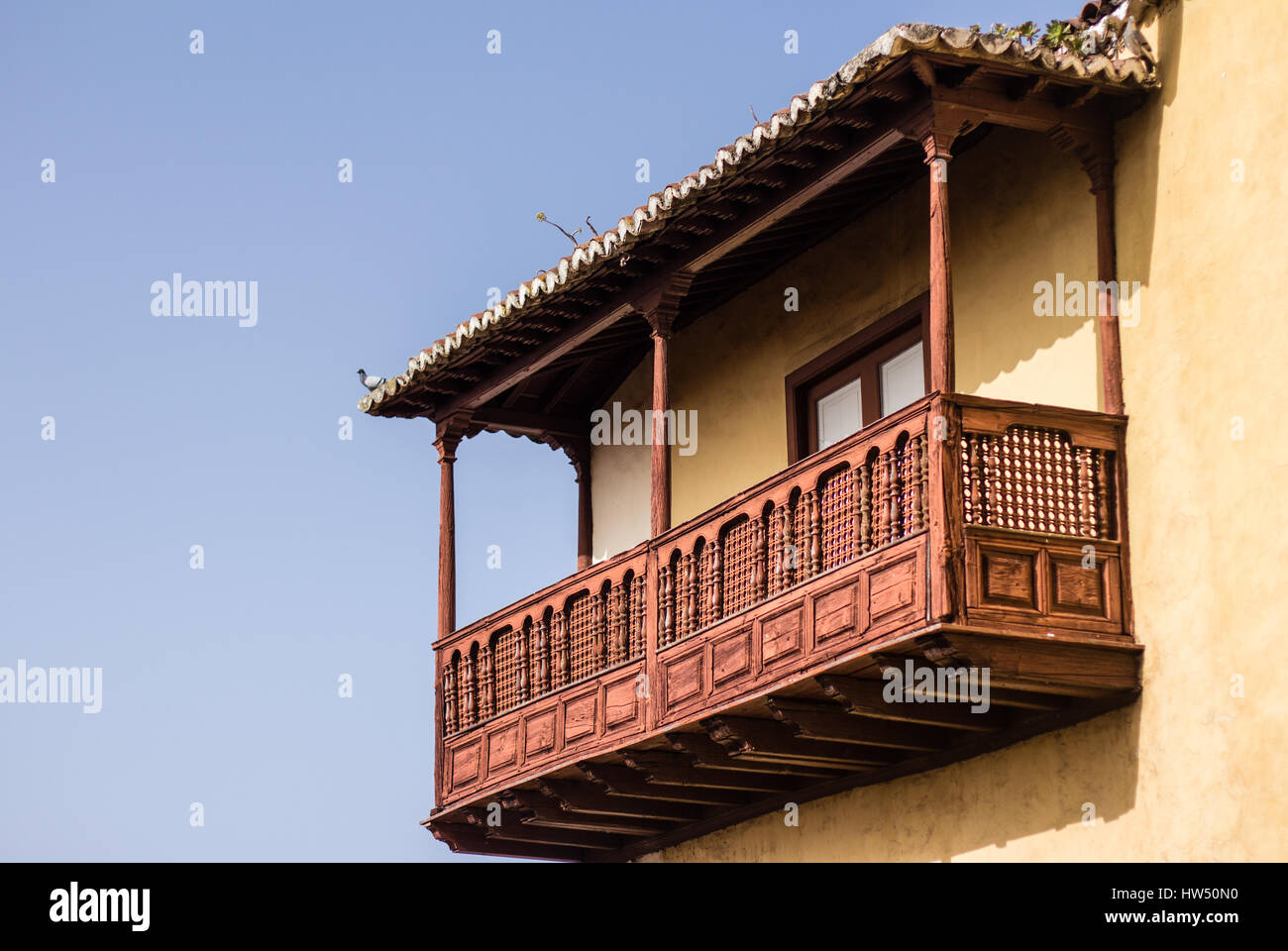 beautiful wooden balcony on traditional house in spain Stock Photo - Alamy