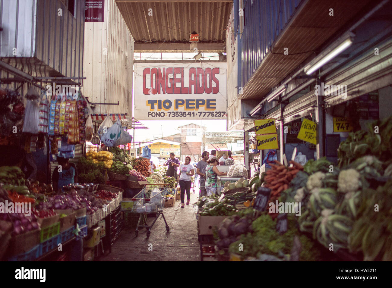 A local market in Santiago de Chile selling vegetables and local ...