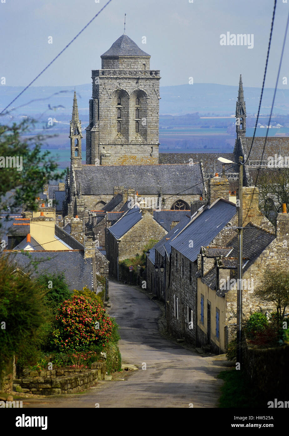 The medieval village of Locronan. St. Ronan Church and Pénity Chapel ...