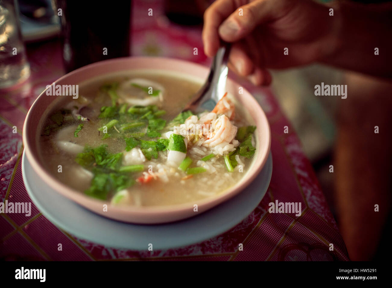 Khao Tom Goong is a rice soup with scrimp and widely eaten as a classic ...