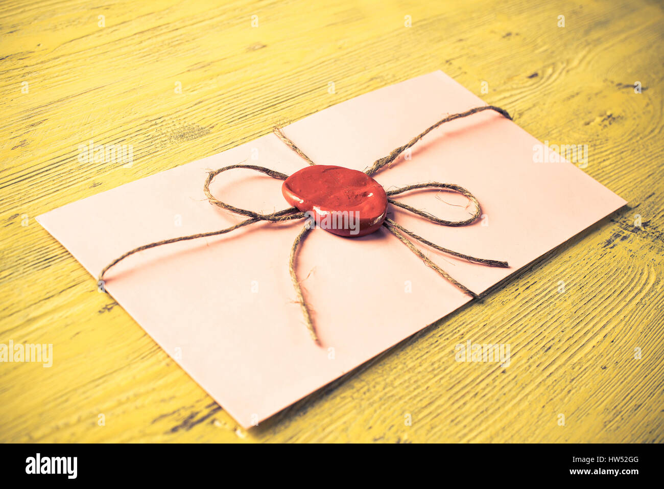 Letter with seal on table Stock Photo - Alamy