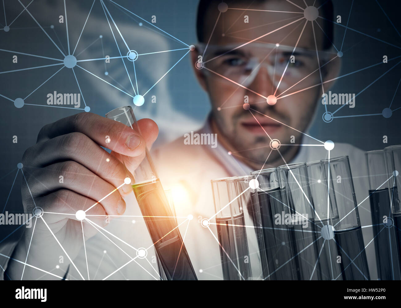 Portrait of concentrated male scientist working with reagents in laboratory Stock Photo - Alamy