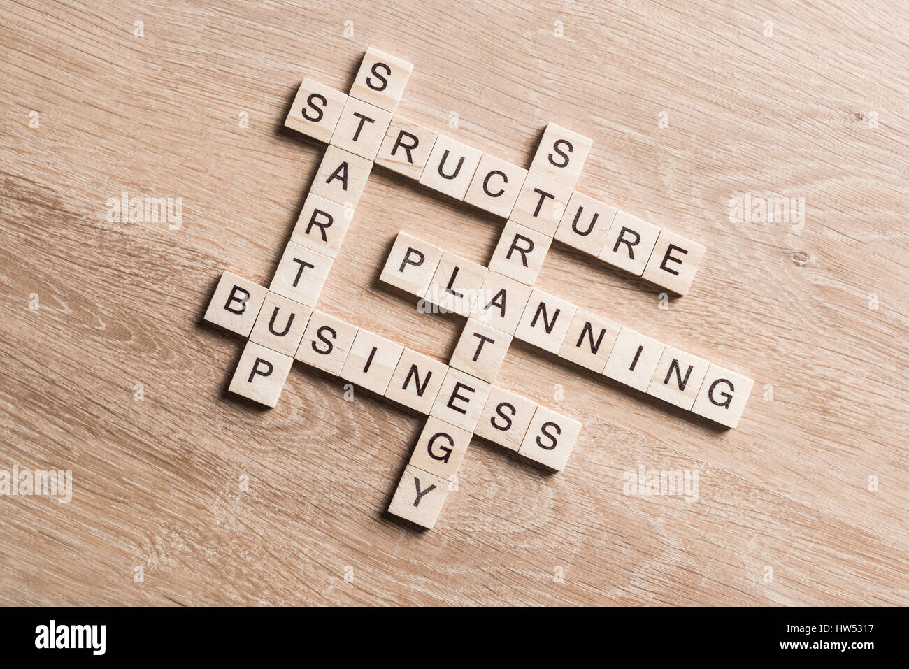 Conceptual business keywords on table with elements of game making ...
