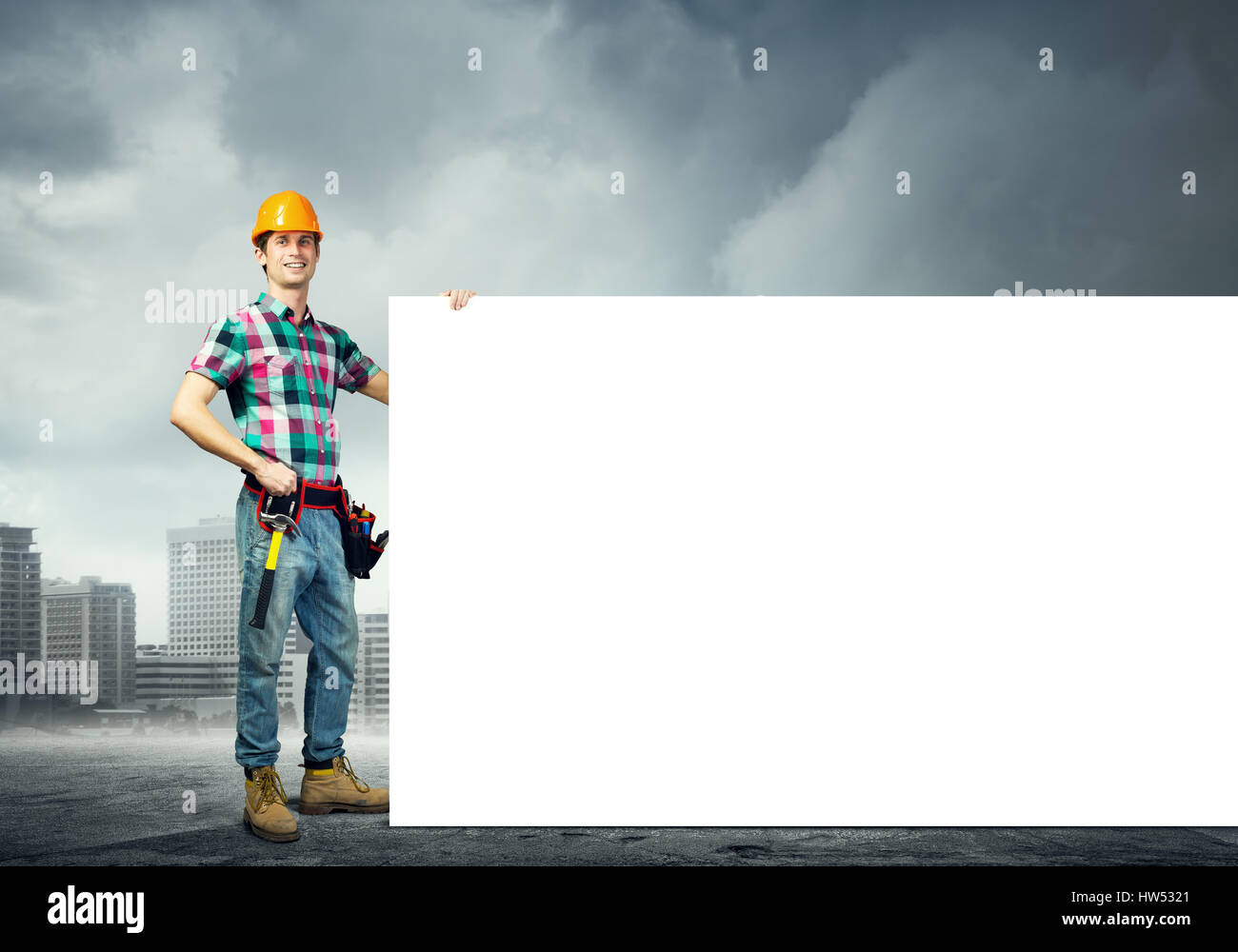 Repairman demonstrating banner Stock Photo - Alamy