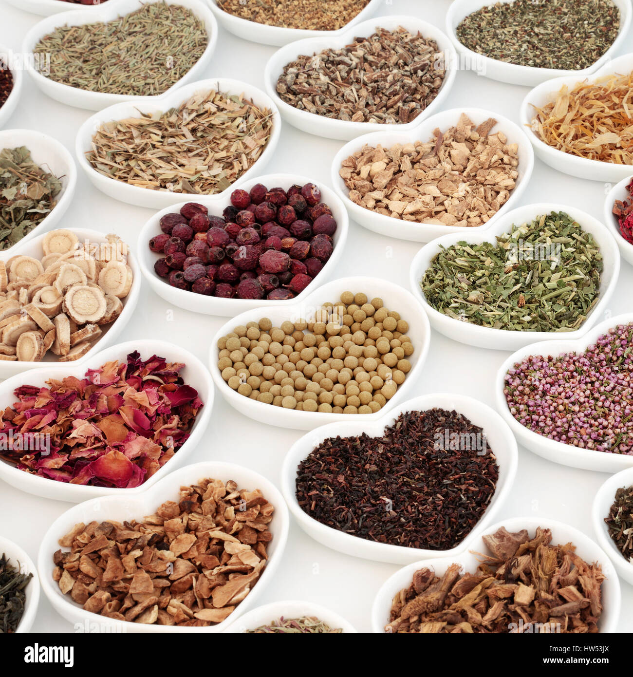 Healthy herb tea collection in china bowls over white background. Teas ...