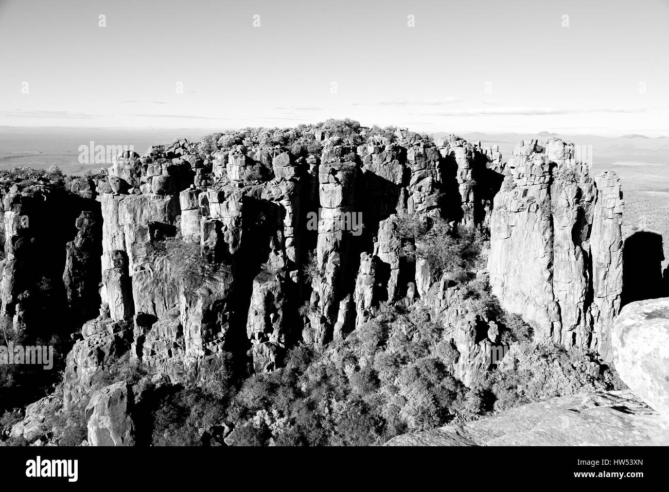 blur in south africa valley of desolation dirty road rock tree and sky ...