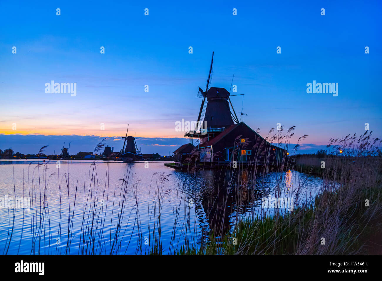 Dutch mill by evening Stock Photo - Alamy