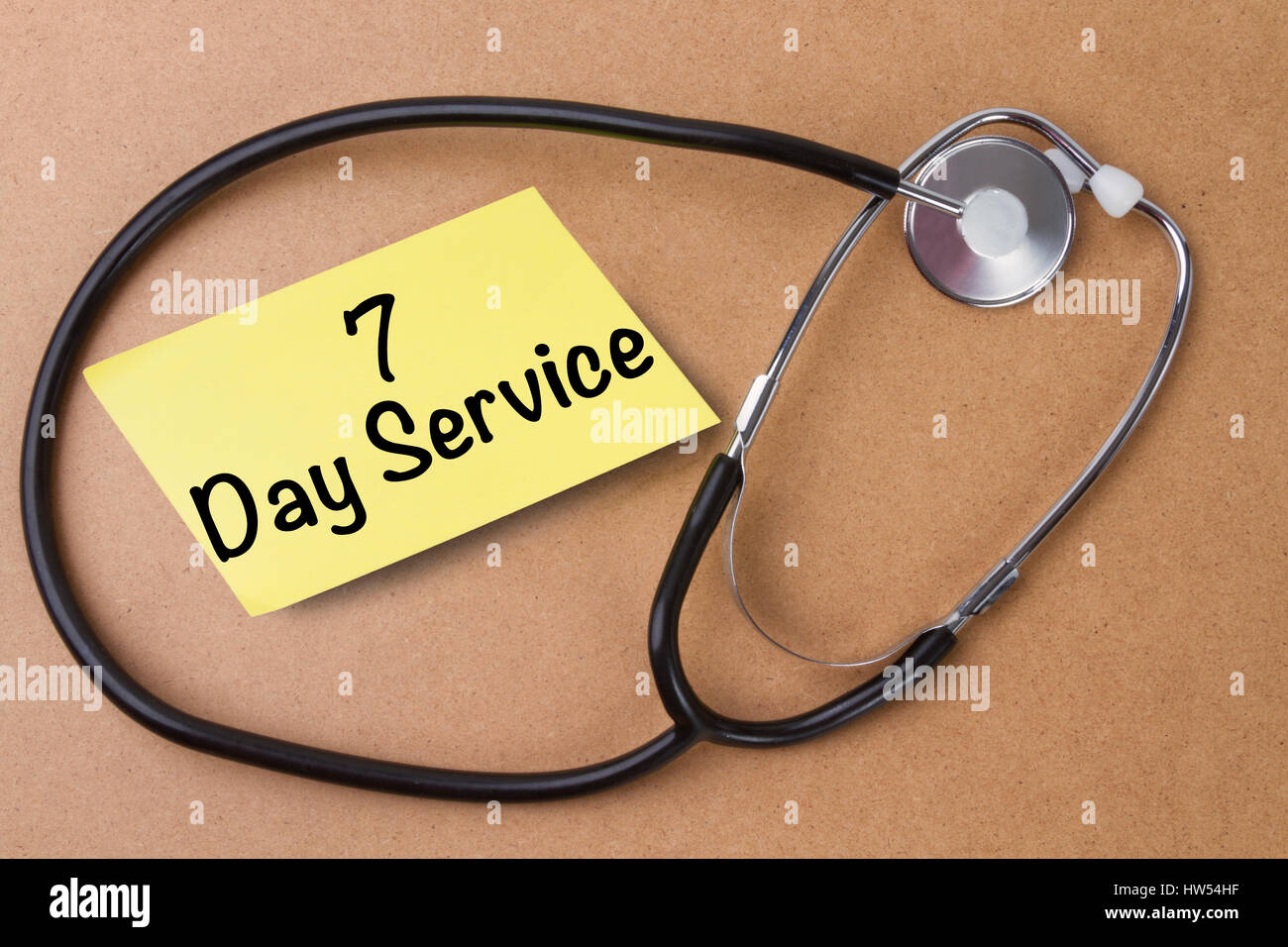 Medical stethoscope with post-it note saying "7 Day Service Stock Photo ...