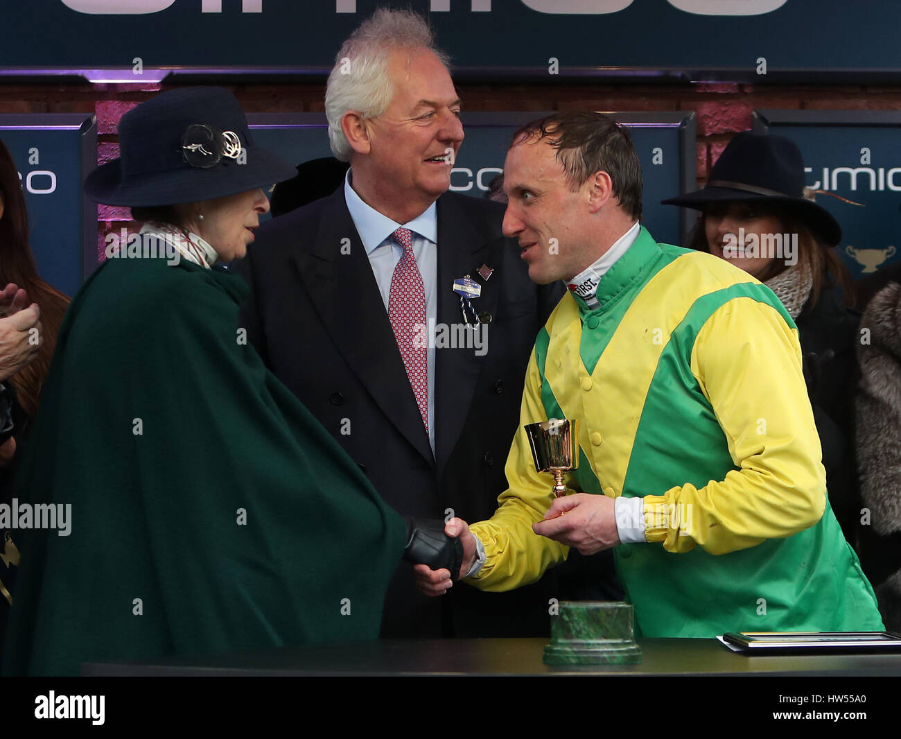 Princess Anne (left) presents Jockey Robbie Power with the Timico Gold ...