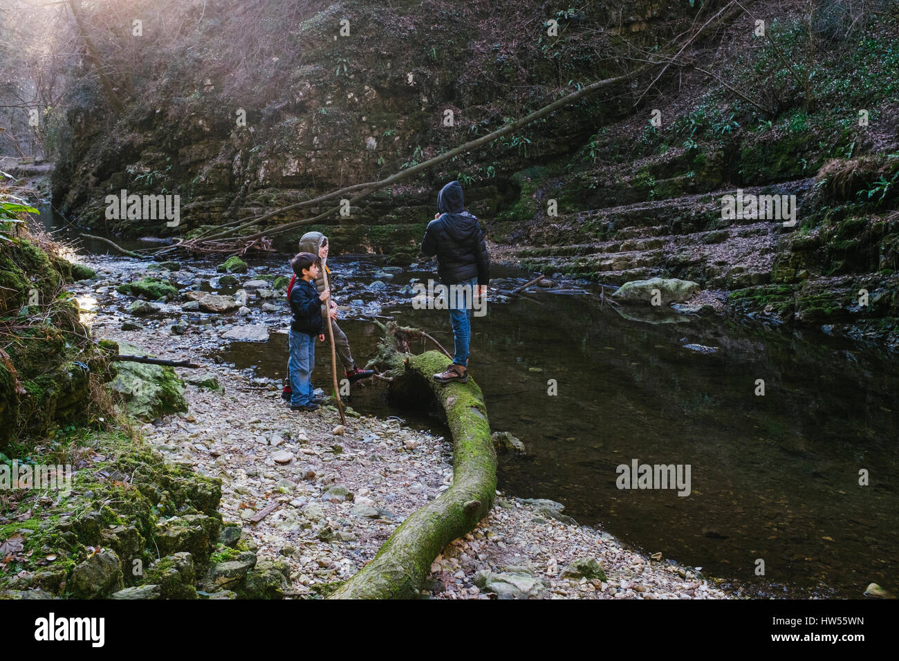 Kids playing along river hi-res stock photography and images - Alamy