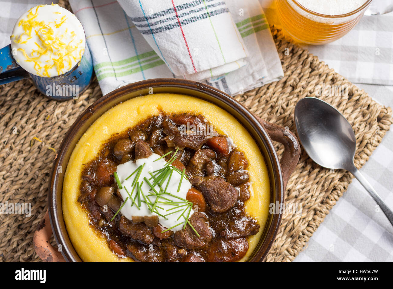 Beef Stew with Mushrooms, Carrots and Corn Polenta Stock Photo - Alamy