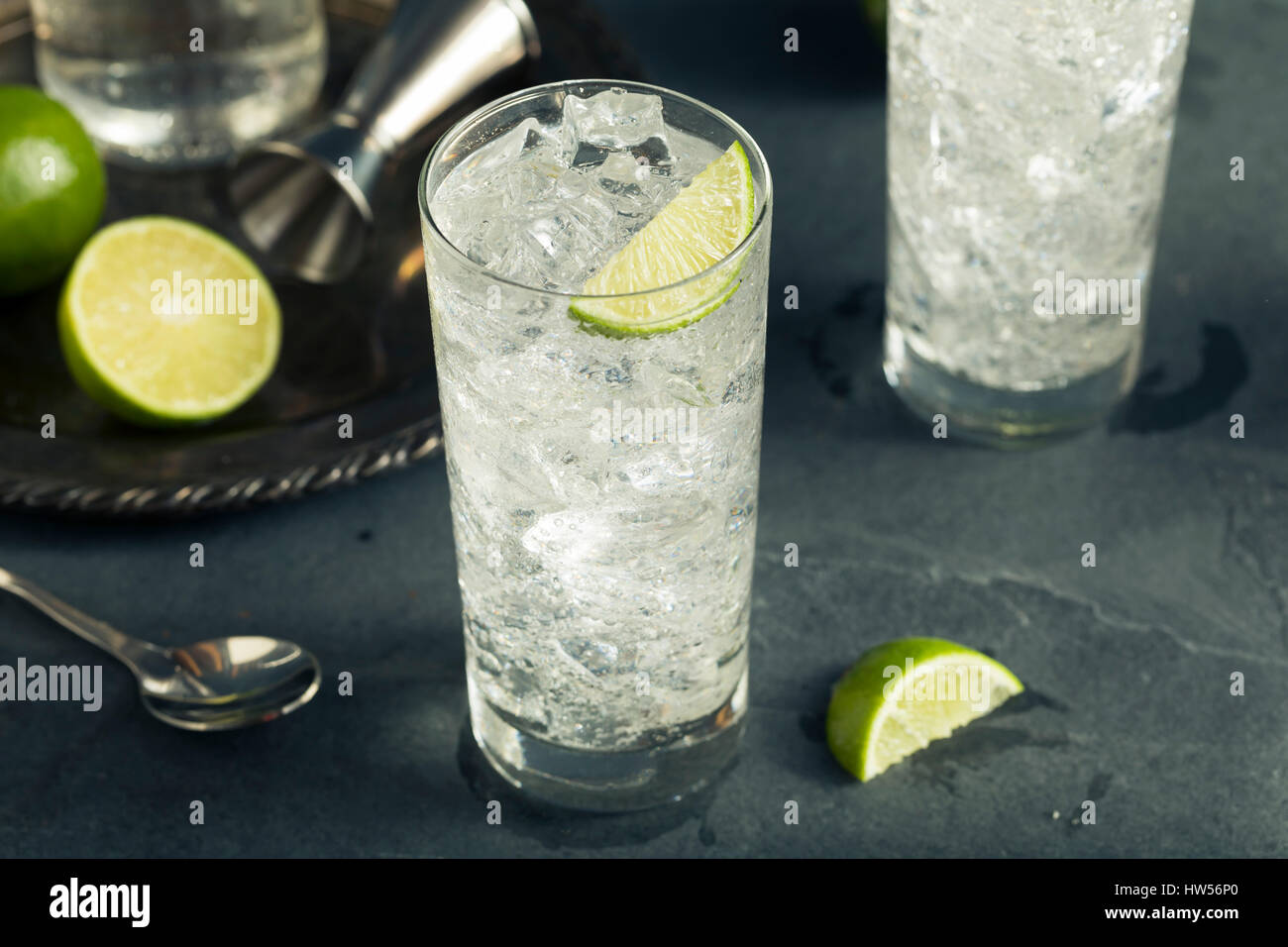 Alcoholic Vodka Tonic Highball Cocktail with a Lime Garnish Stock Photo - Alamy