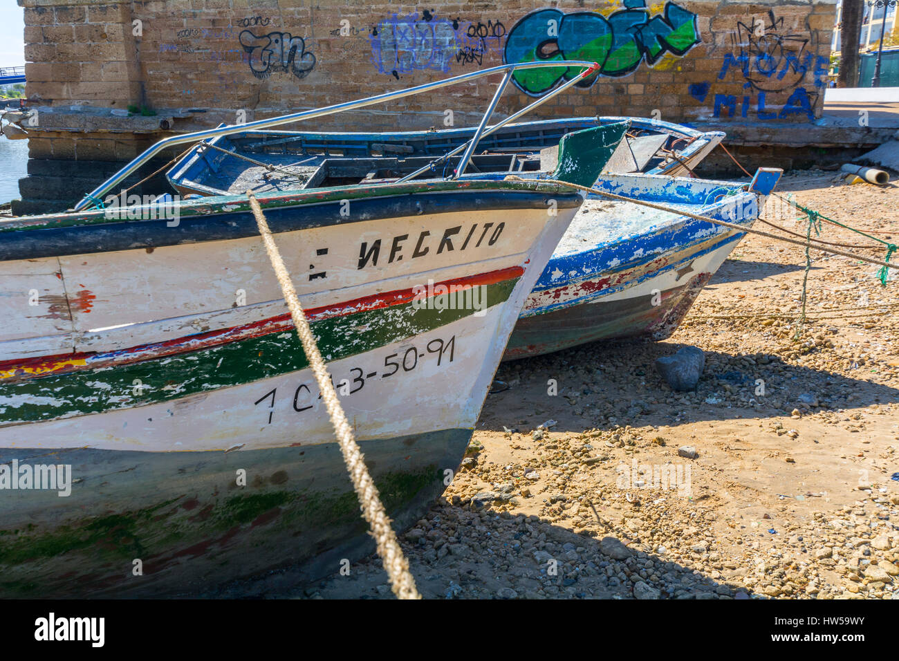 Old fishing boats on the shore of a river, very colorful Stock Photo ...