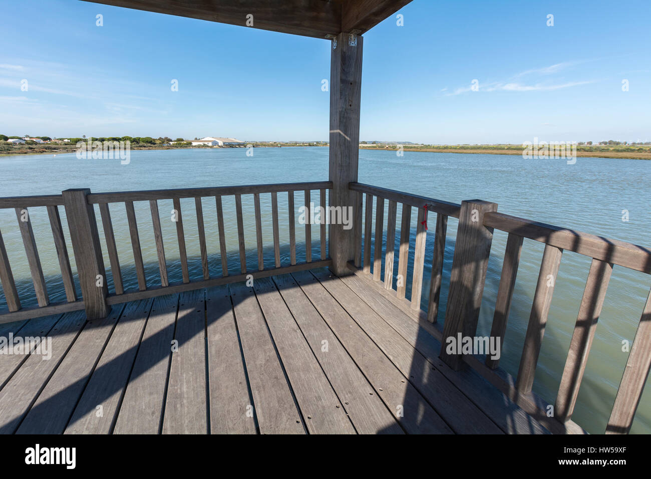 Wooden bridge pier in a river Stock Photo - Alamy