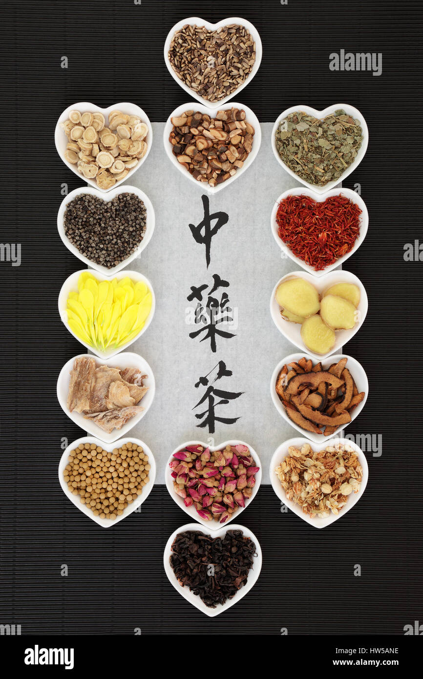 Traditional chinese herb tea selection with calligraphy on rice papeR ...