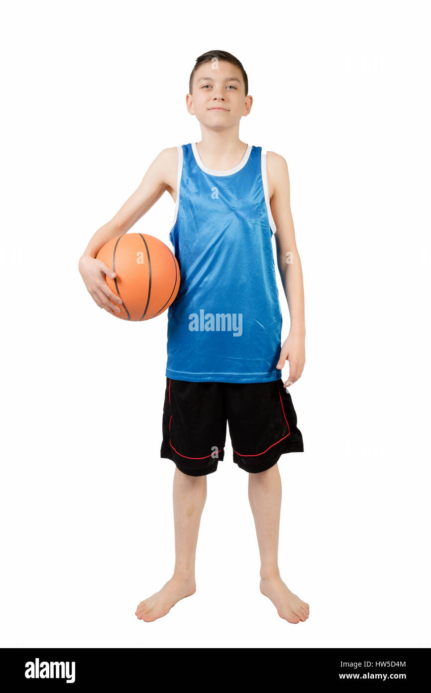 Young caucasian teenage boy with a basketball Stock Photo - Alamy