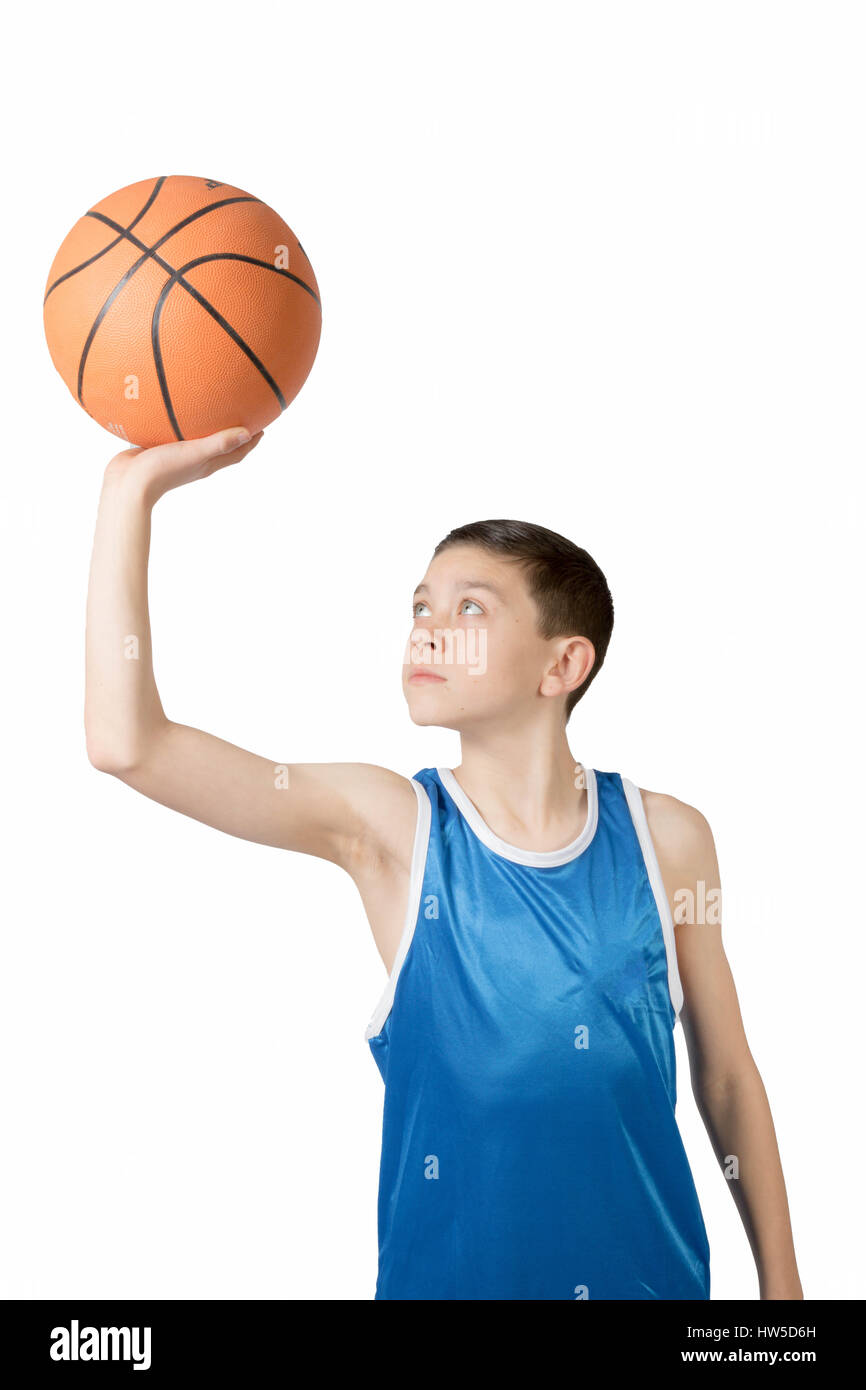 Young caucasian teenage boy with a basketball Stock Photo - Alamy