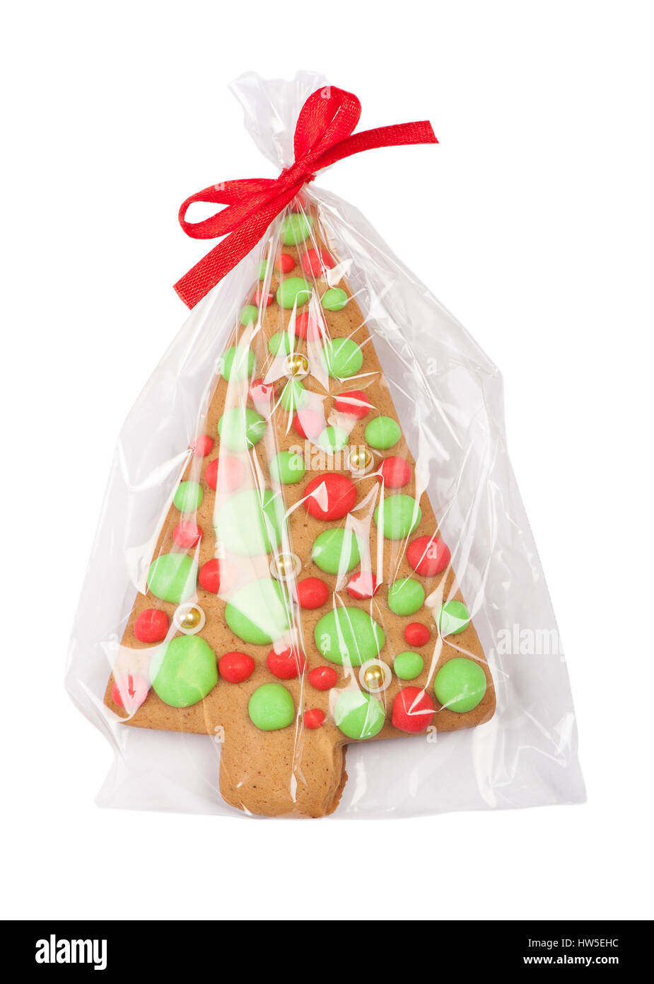 Christmas gingerbread tree cookie in transparent packing with a bow ...